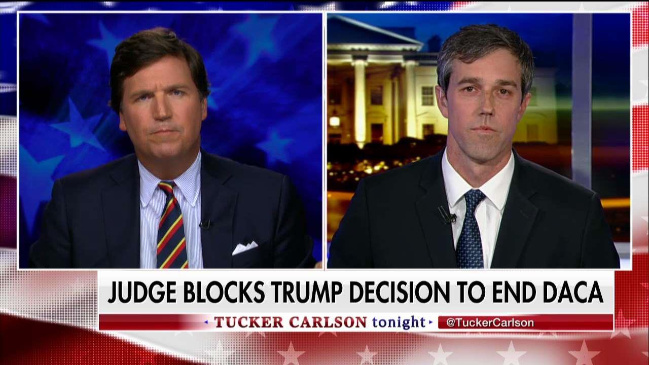 Tucker Presses Cruz Challenger on Health Care for Illegals | Fox News Video