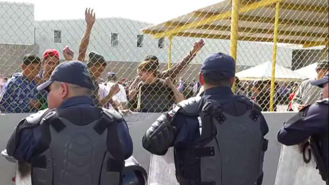 2,000 migrants are being housed in a warehouse in Mexico across the ...